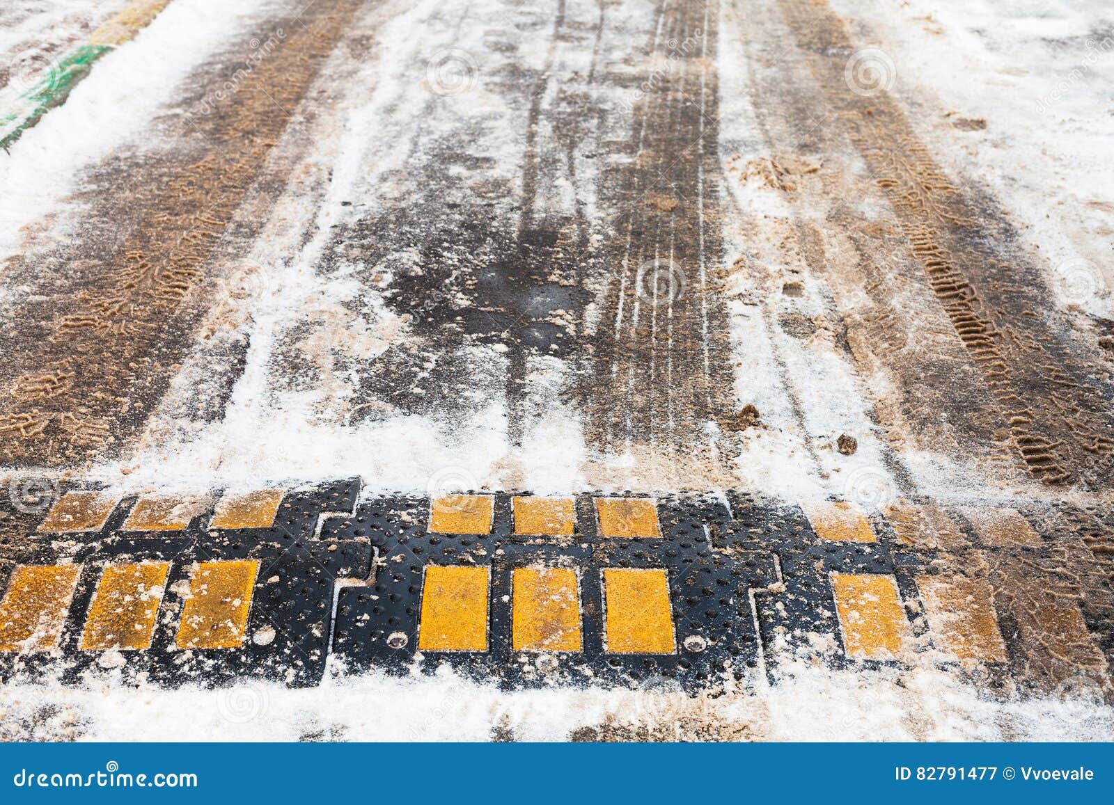 Speed Bump in Snow on Urban Road in Winter Stock Image - Image of ...