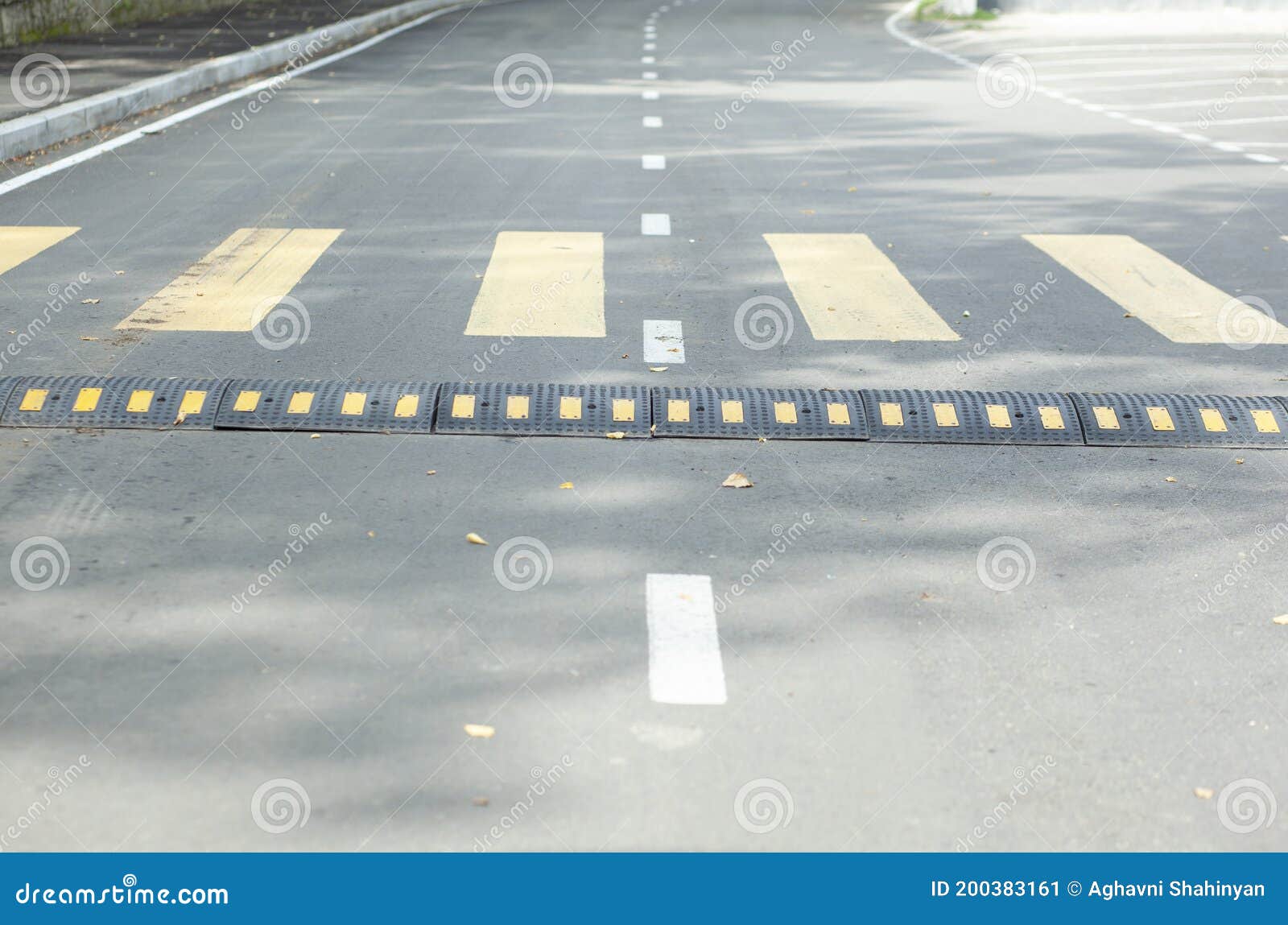 Speed hump on an asphalt stock image. Image of ramp - 200383161