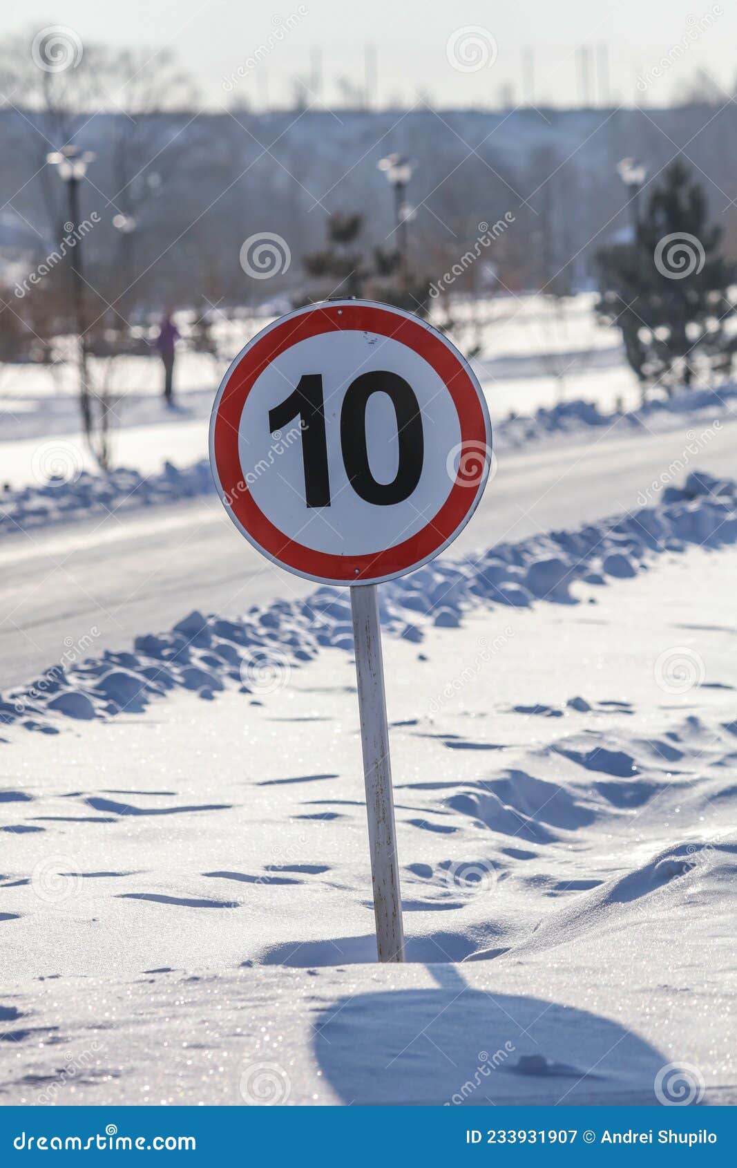 Speed Limit Sign 10 on the Road in the Snow. Stock Image - Image of ...
