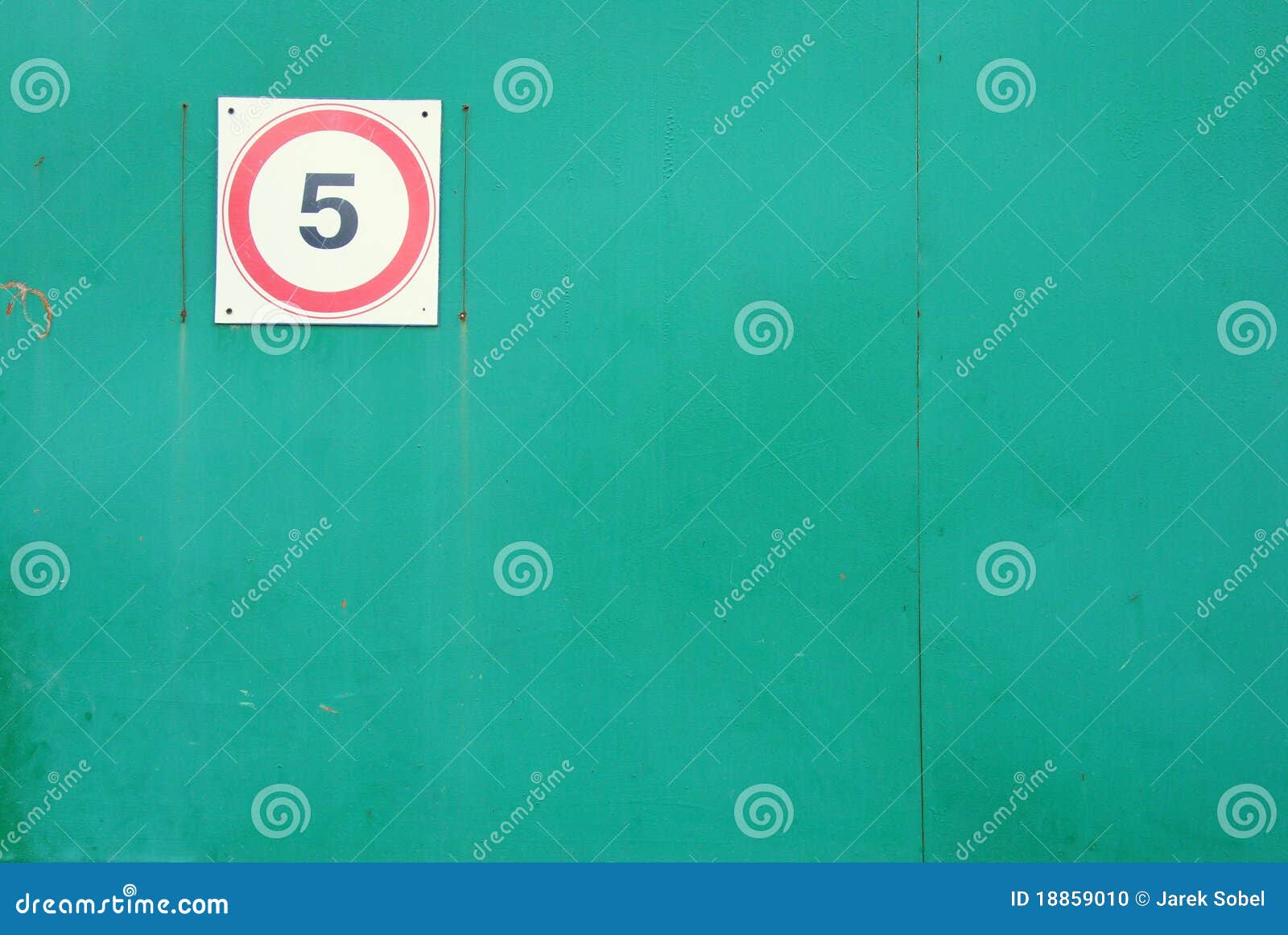 Speed Limit To 5 Sign on the Green Gate Stock Photo - Image of white ...