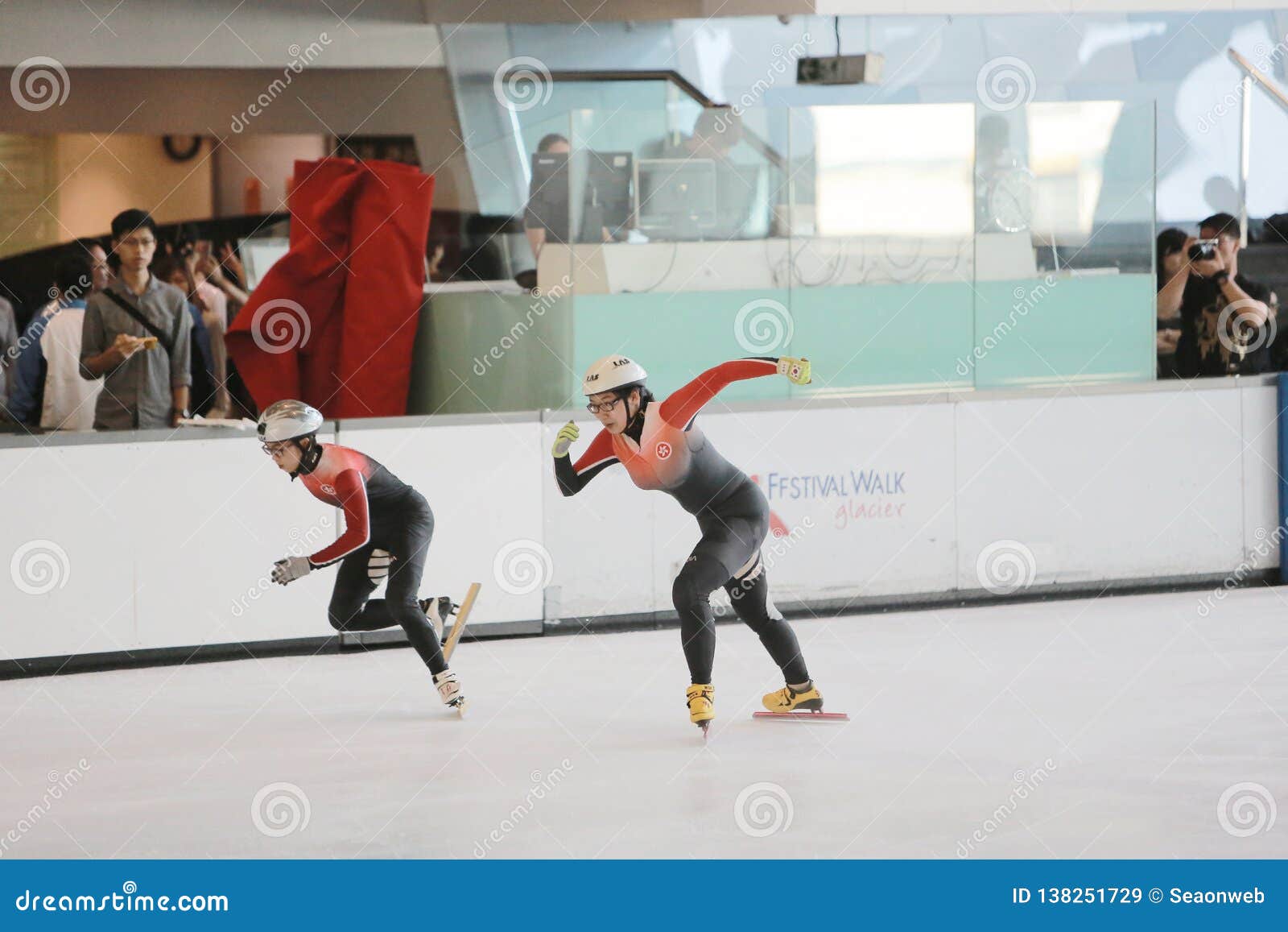Speed Skaters during a Race Editorial Stock Image - Image of suit ...