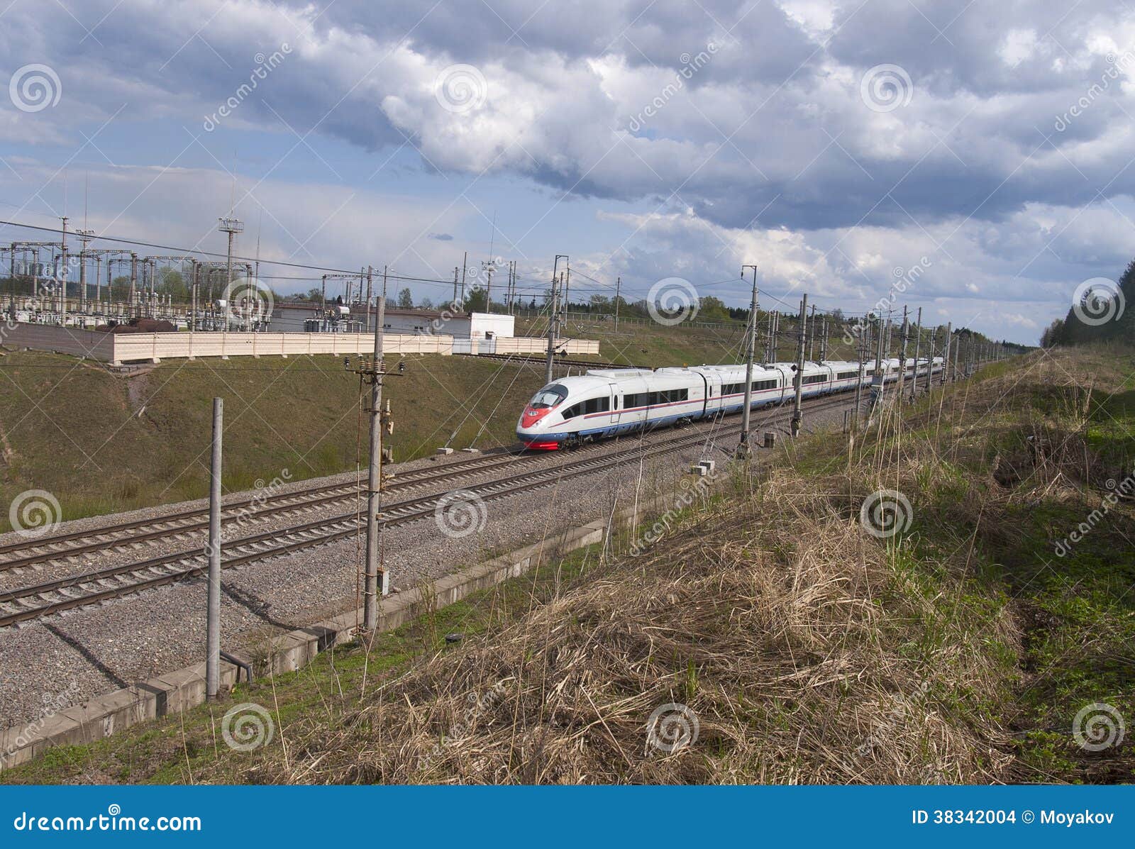Speed Train Near a Power Substation Stock Photo - Image of road, track ...