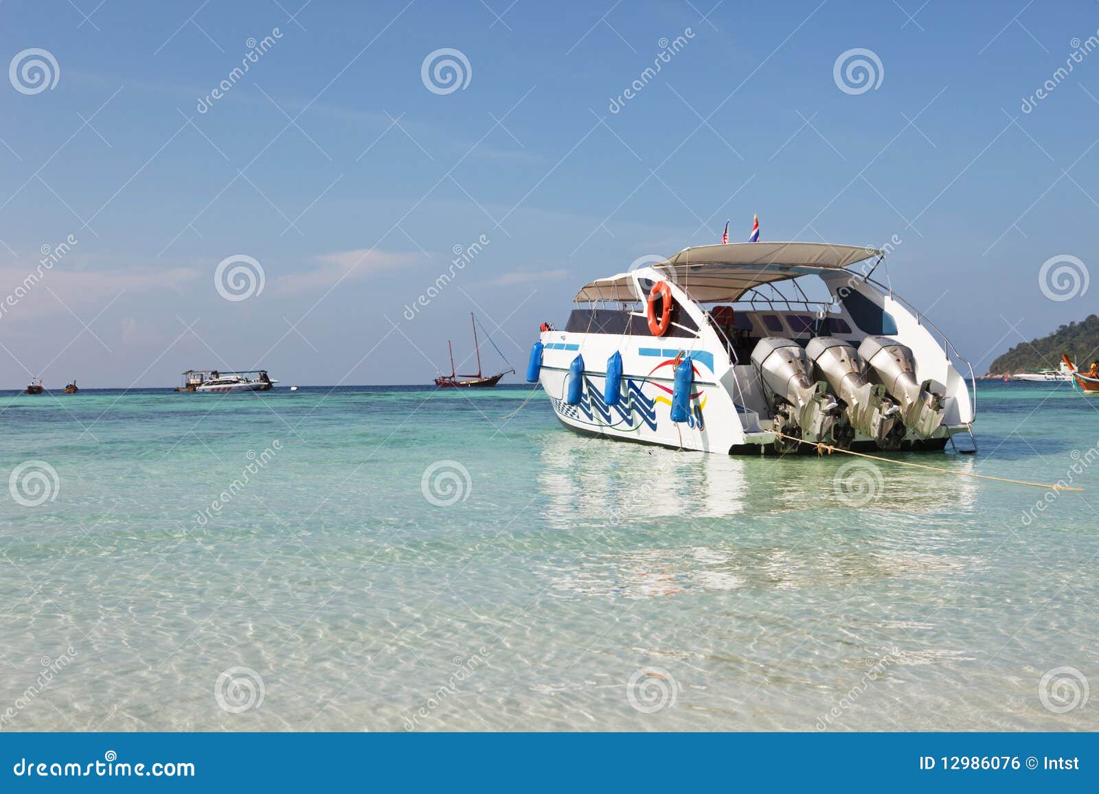 Speedboat in beach stock photo. Image of cliff, speedboat - 12986076
