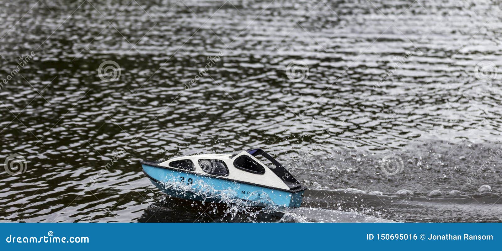 Speedboat Racing on a Lake Causing Waves Stock Photo - Image of control ...