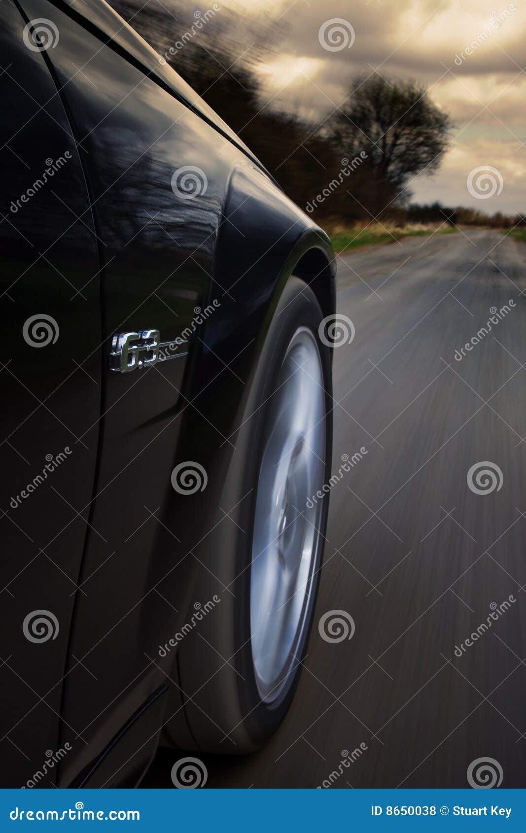 Speeding Car on Country Road Stock Photo - Image of liter, automobiles ...