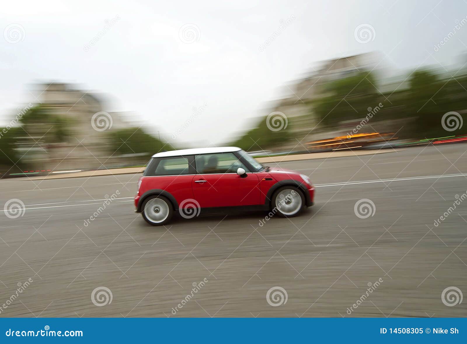 Speeding car (Mini Cooper) stock image. Image of commuting - 14508305
