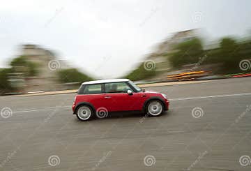 Speeding car (Mini Cooper) stock image. Image of commuting - 14508305