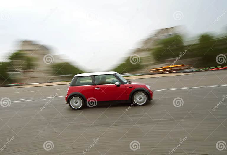 Speeding car (Mini Cooper) stock image. Image of commuting - 14508305