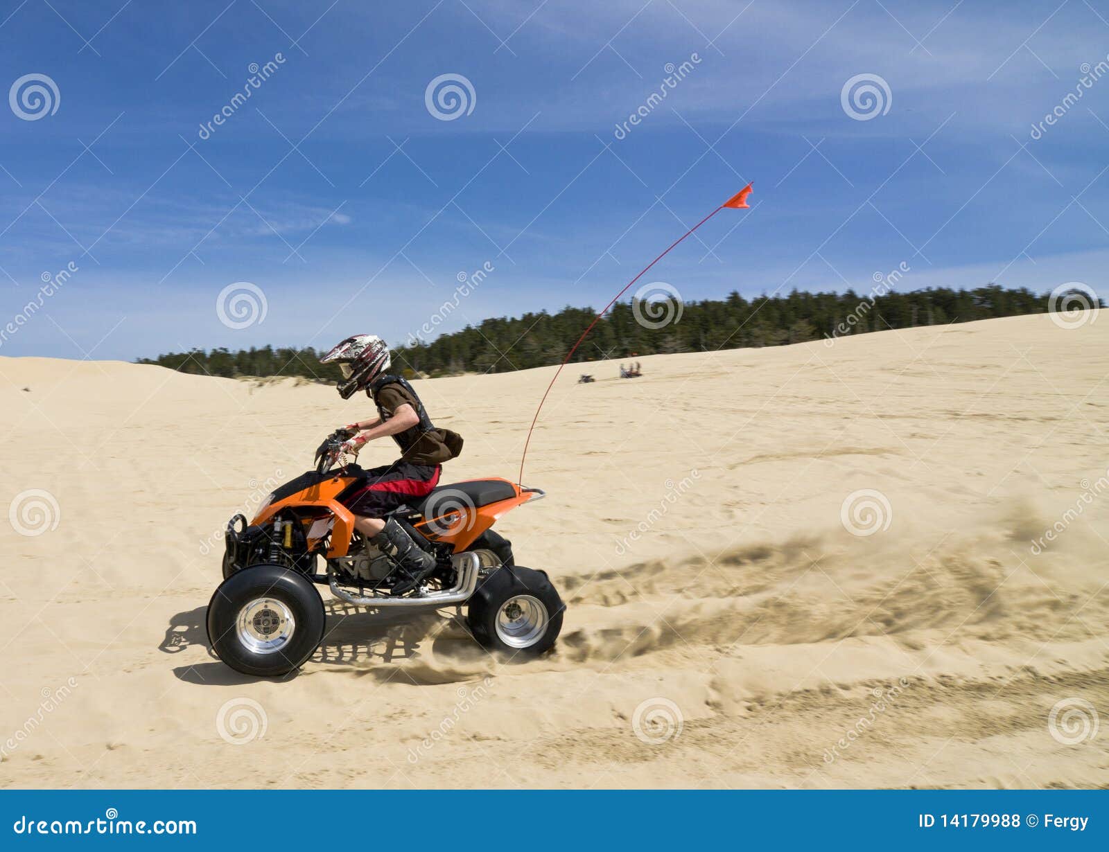 Speeding Quad in Sand Dunes Stock Photo - Image of coast, angle: 14179988