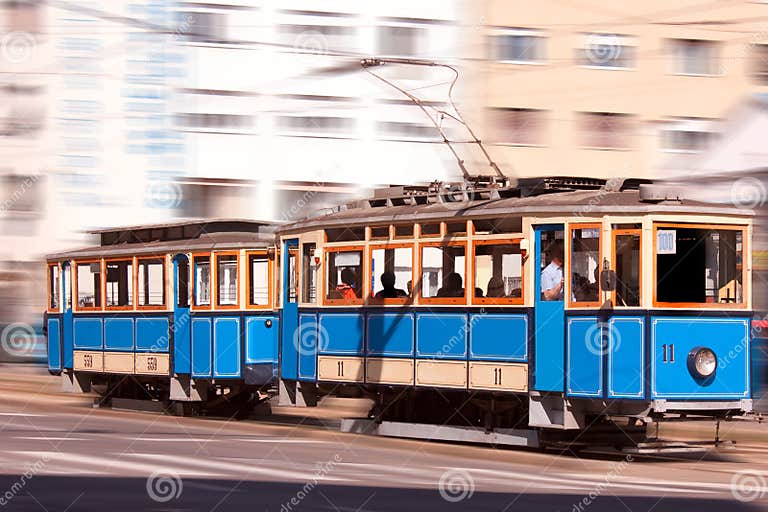 Speeding tram in the city stock image. Image of outdoors - 15319079