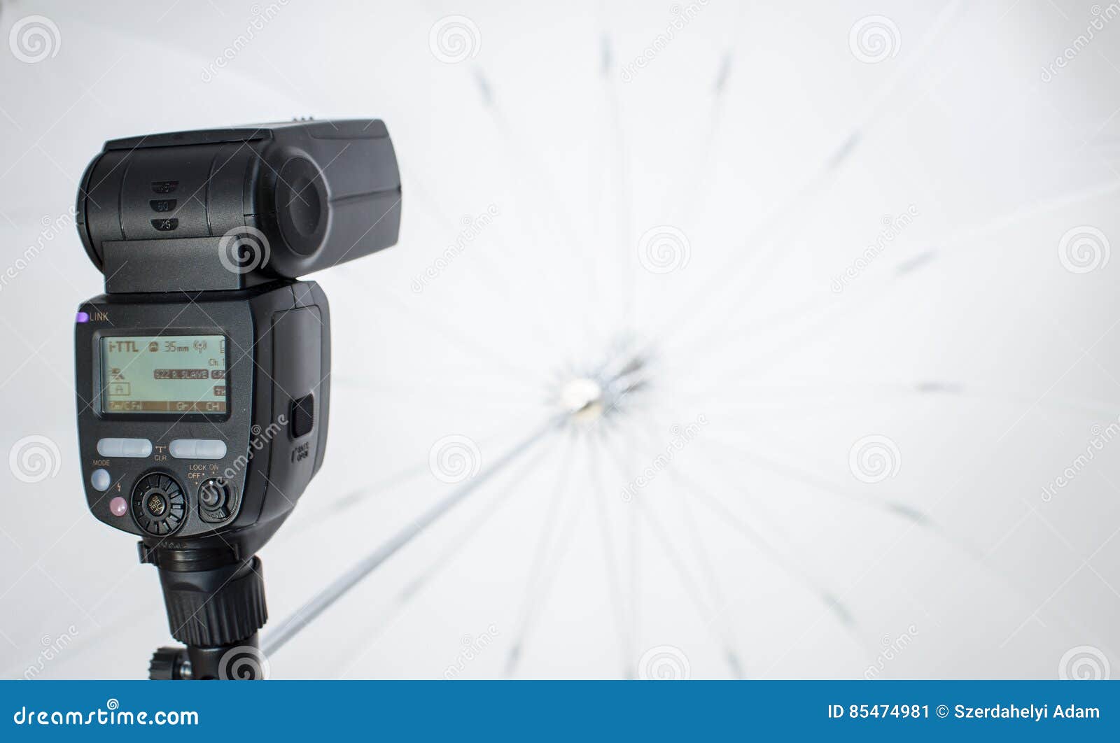 Speedlight with umbrella stock image. Image of electricity - 85474981