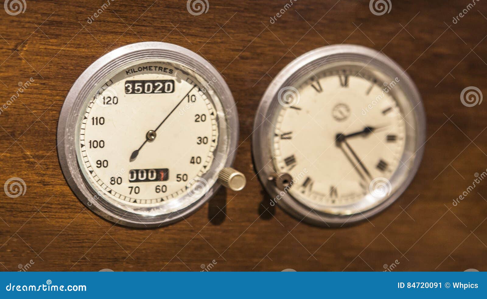 Speedometer and Clock Over Wooden Surface Stock Image - Image of ...