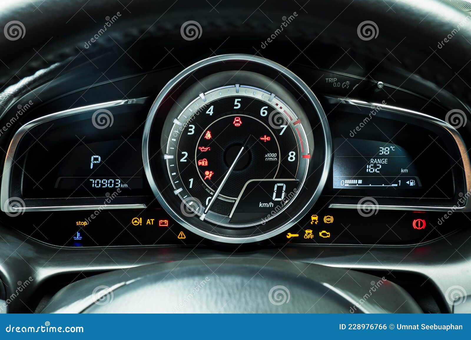 The Speedometer of a Modern Car Illuminated, a Sign of Engine Work ...