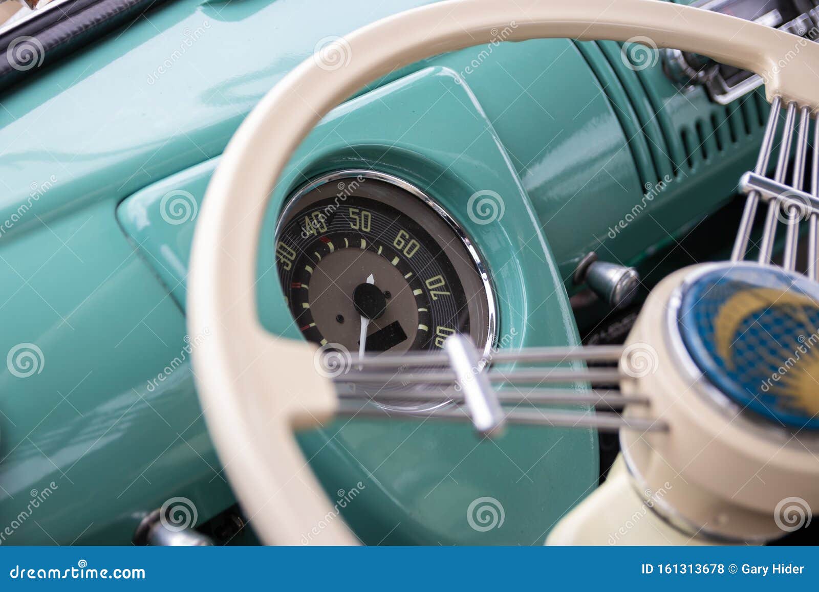 The Speedometer of a Vintage Car Shown through a Steering Wheel ...