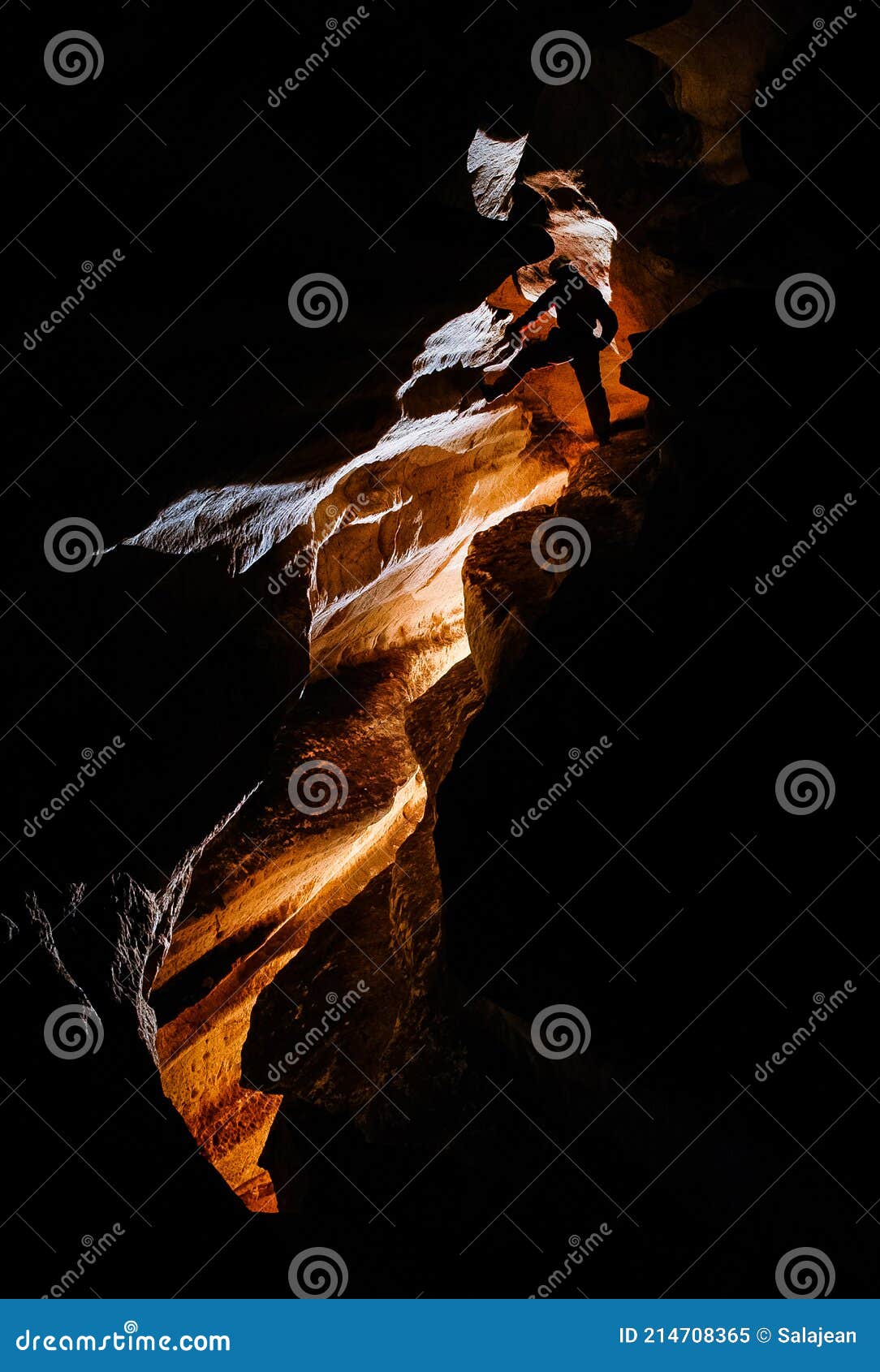 Speleologist Exploring a Deep Cave Stock Image - Image of ...