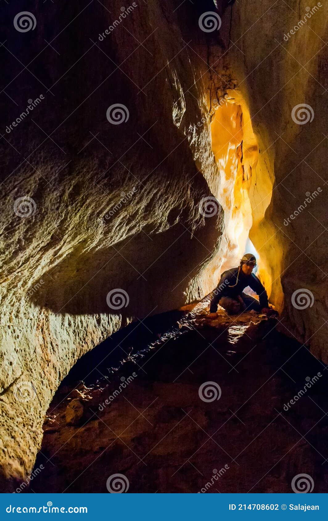Speleologist Exploring a Deep Cave Stock Photo - Image of explorer ...