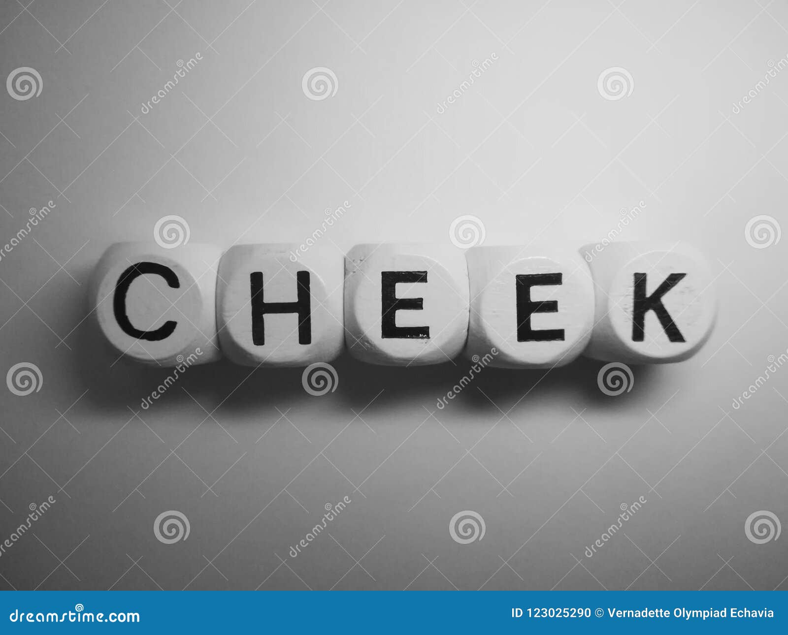 Word cheek spelled on dice stock photo. Image of block - 123025290
