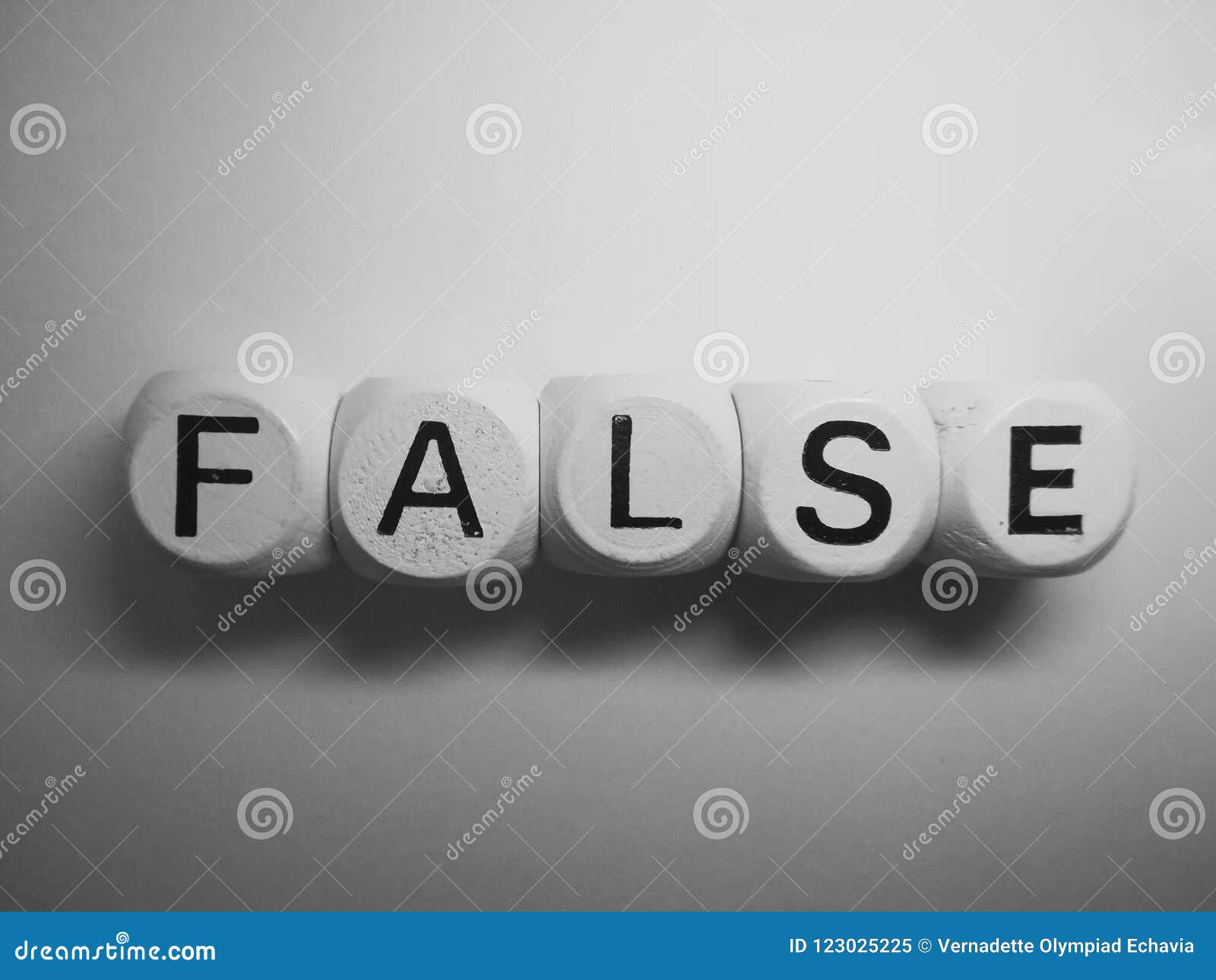 Word false spelled on dice stock image. Image of company - 123025225