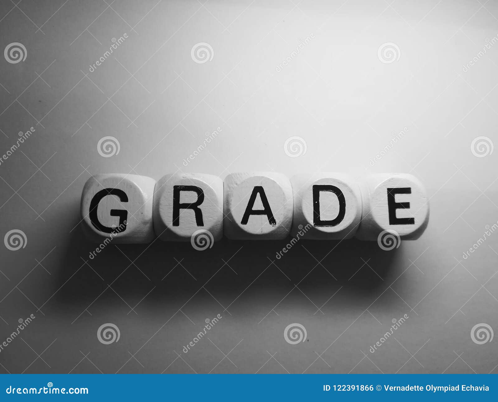 Word grade spelled on dice stock photo. Image of typescript - 122391866