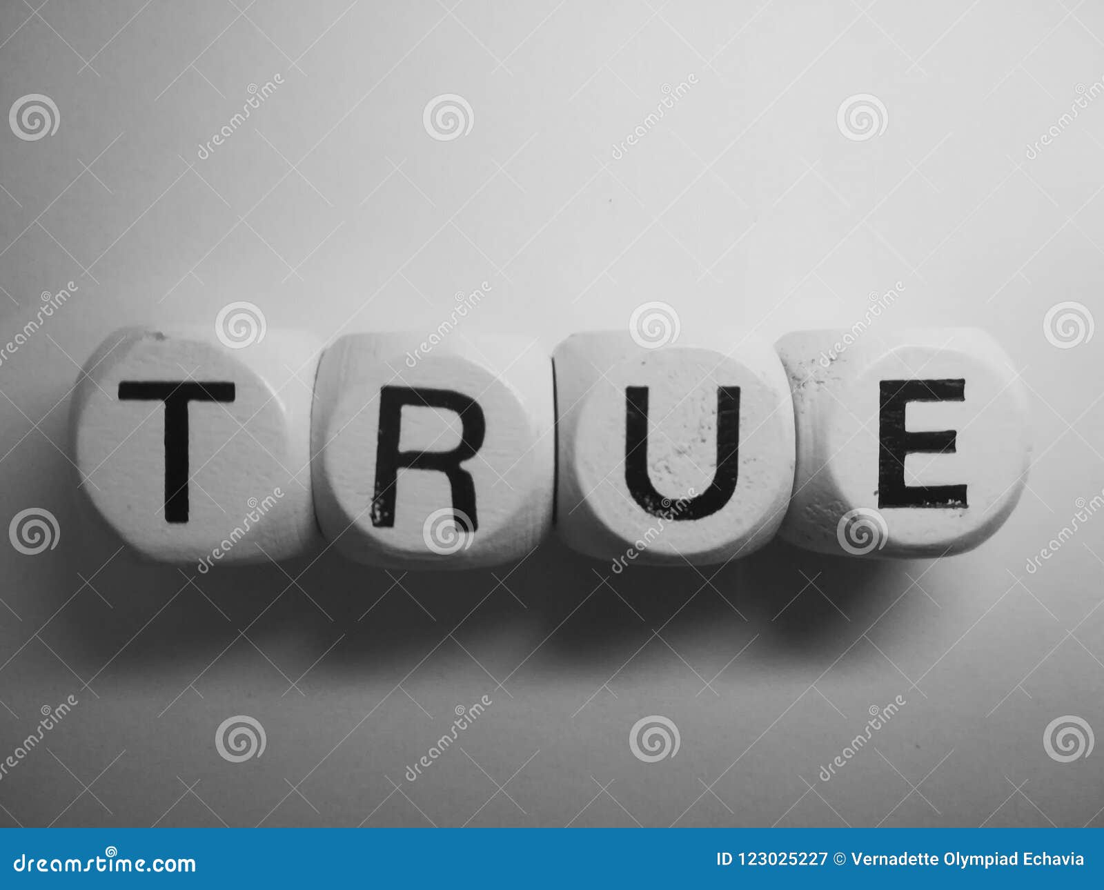 Word true spelled on dice stock image. Image of black - 123025227