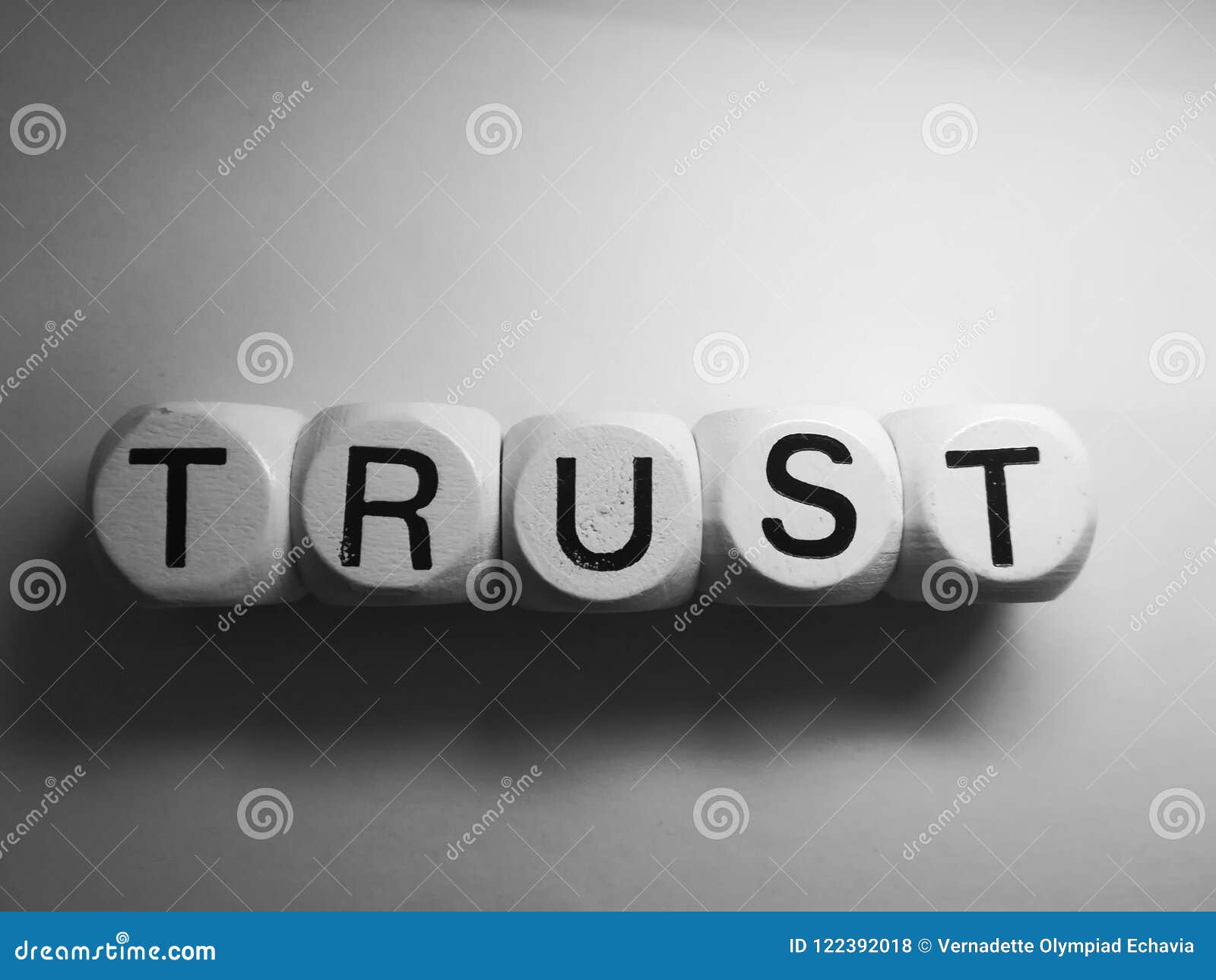 Word trust spelled on dice stock photo. Image of word - 122392018