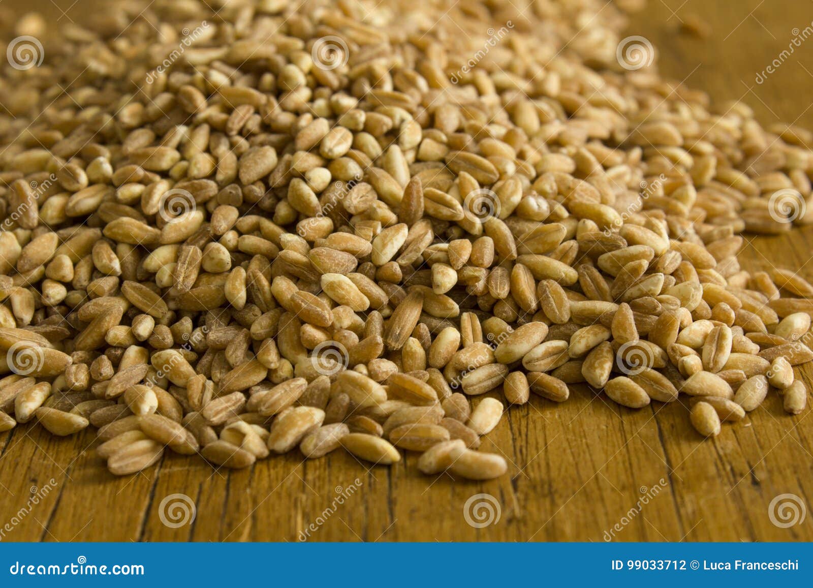 Spelt on a table stock photo. Image of kernels, horizontal - 99033712