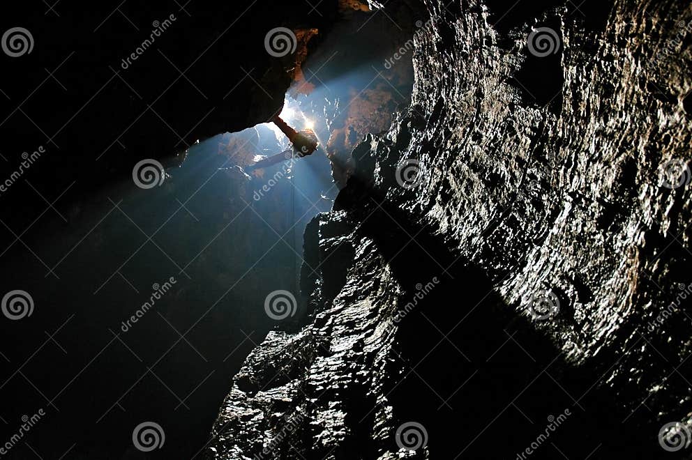 Spelunker Abseiling in a Cave Stock Image - Image of caver, pothole ...