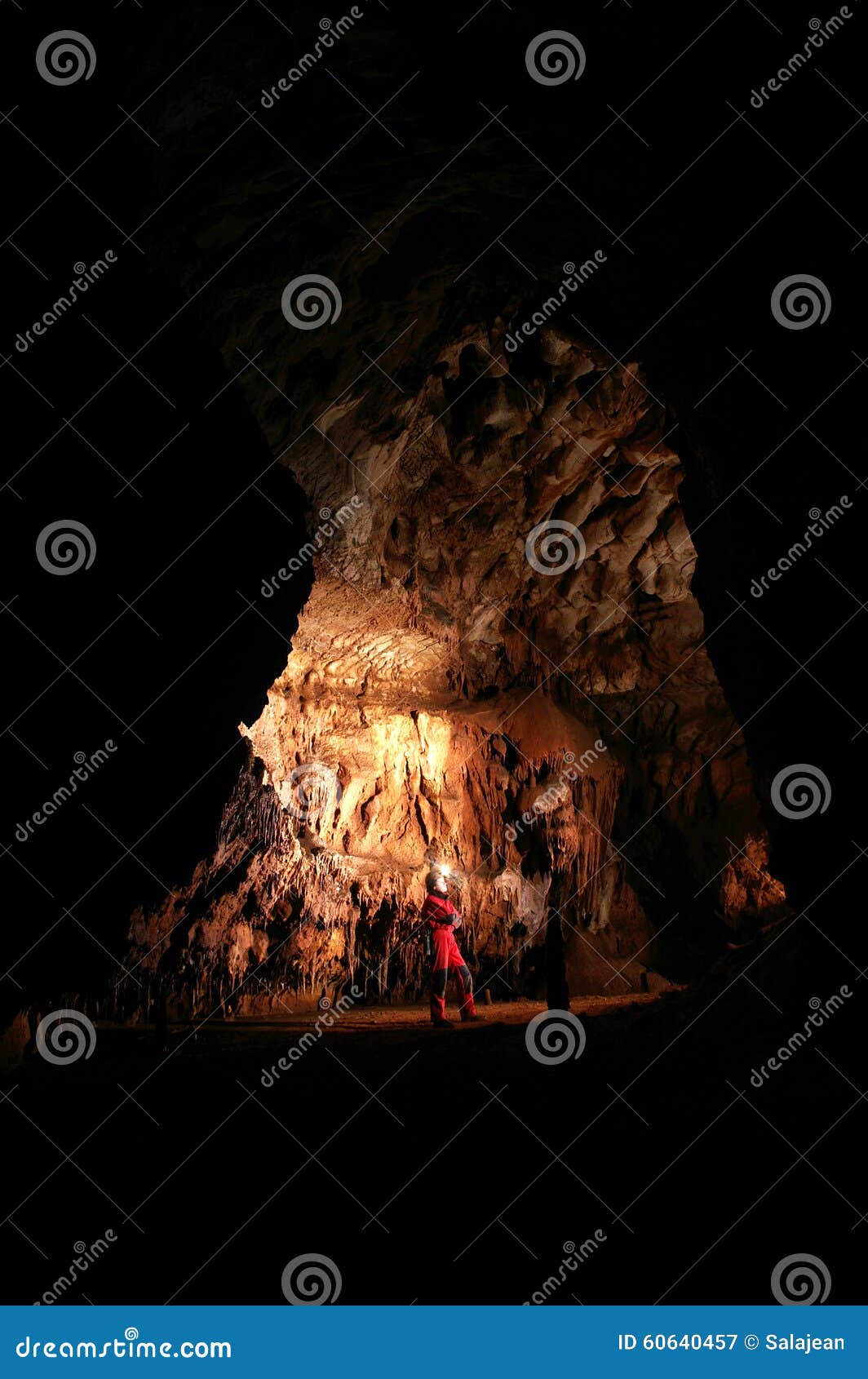 Spelunker in a cave stock image. Image of formation, caver - 60640457