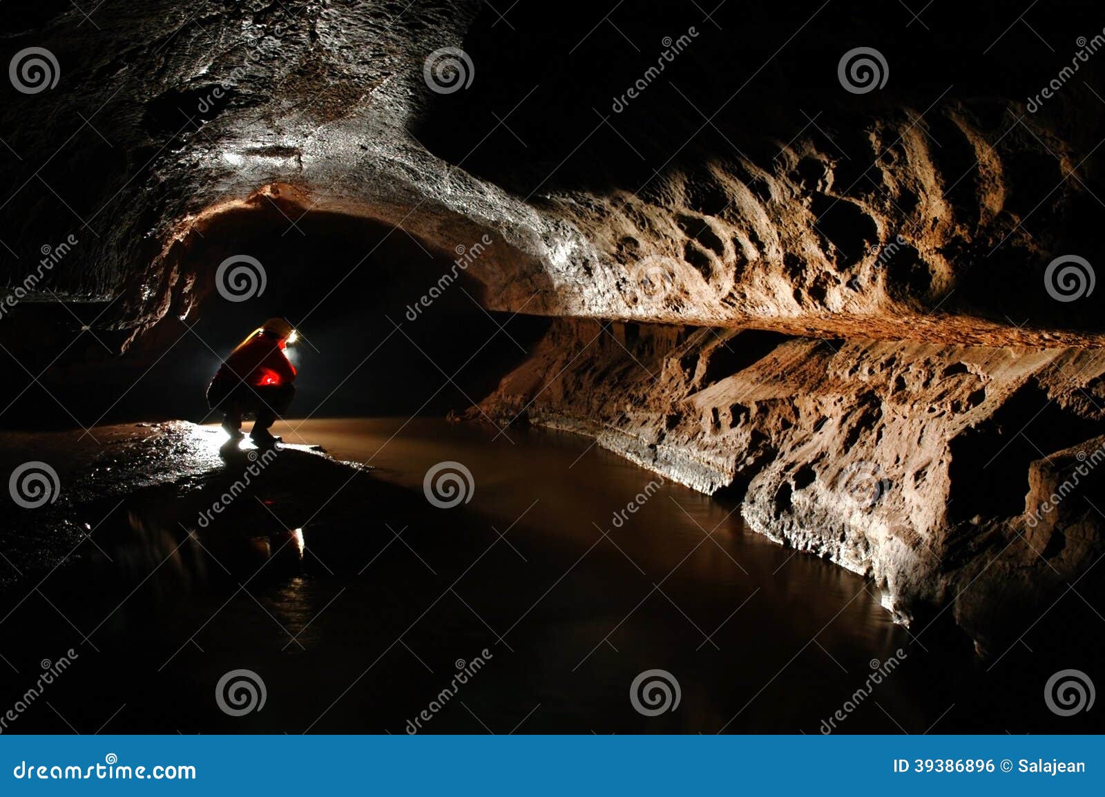 Spelunker Exploring the Cave Stock Photo - Image of exploring, dark ...