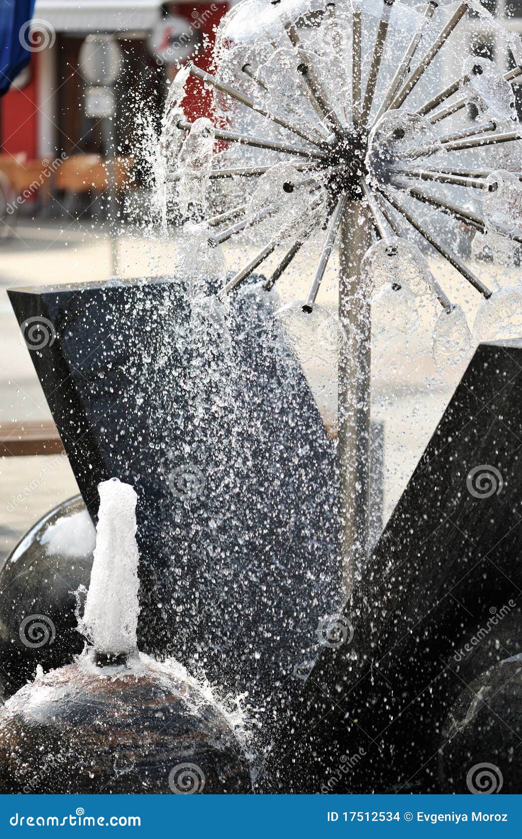 The Fountain Spouting Water From A Vertical Cylindrical Nozzle In A ...