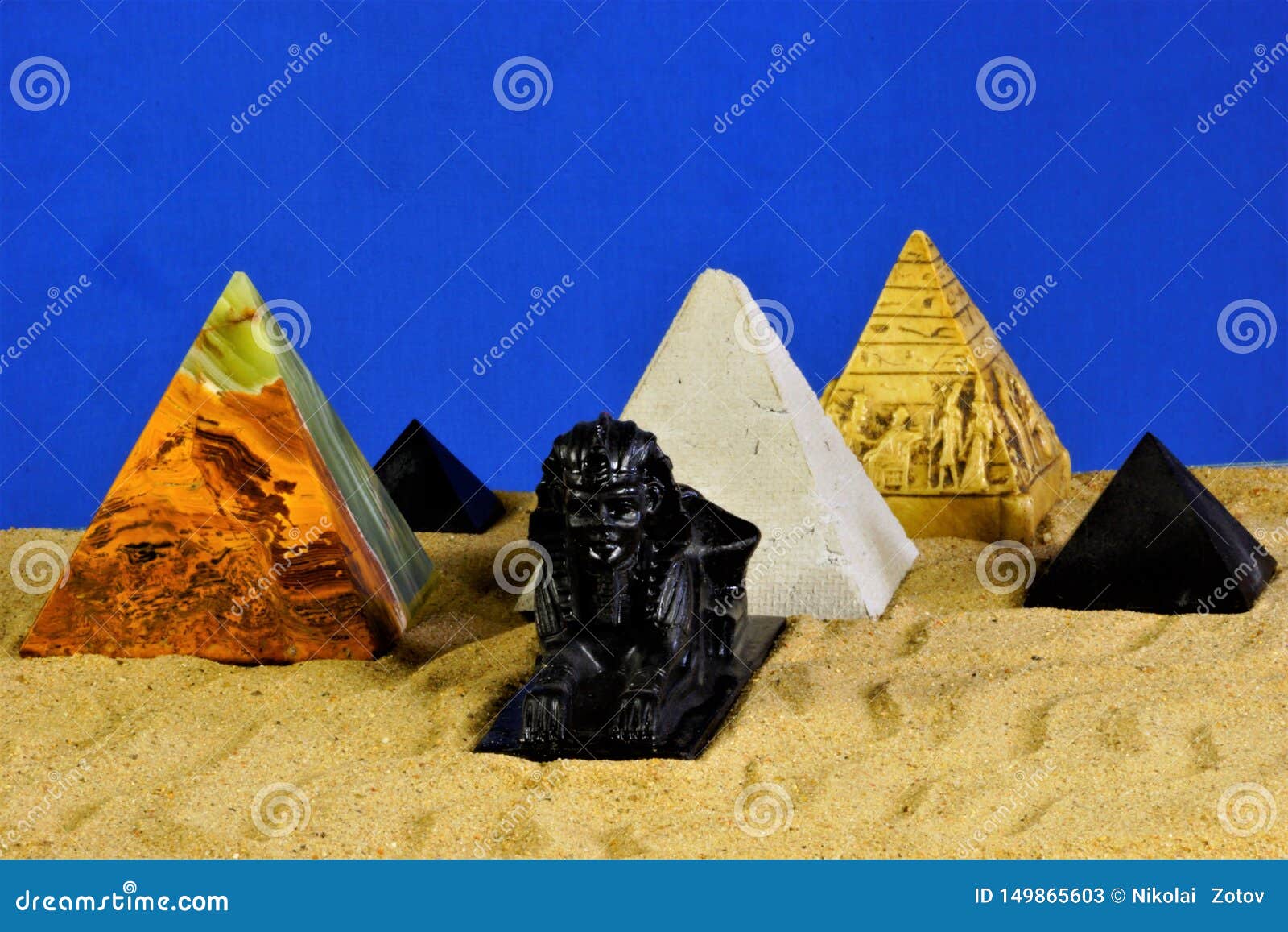 The Sphinx and Pyramids in the Sand on a Blue Background. Pyramid ...