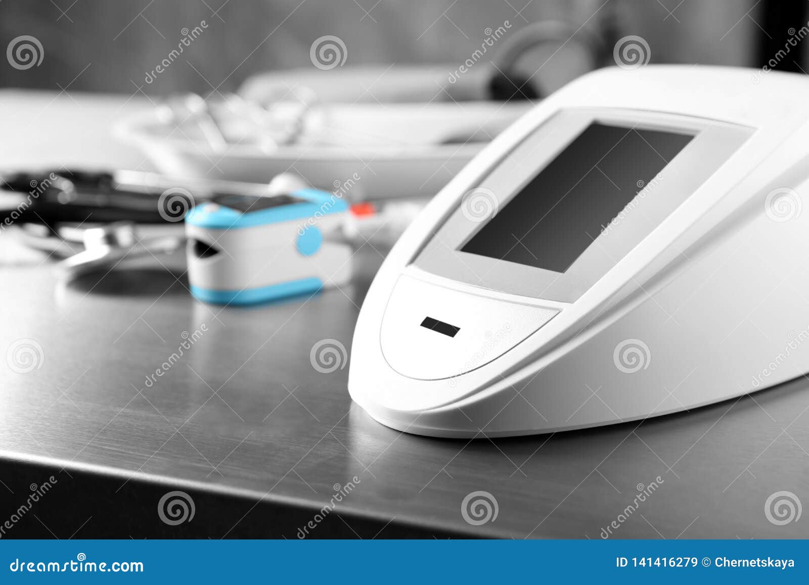 Sphygmomanometer and Other Medical Objects on Grey Table. Stock Image ...