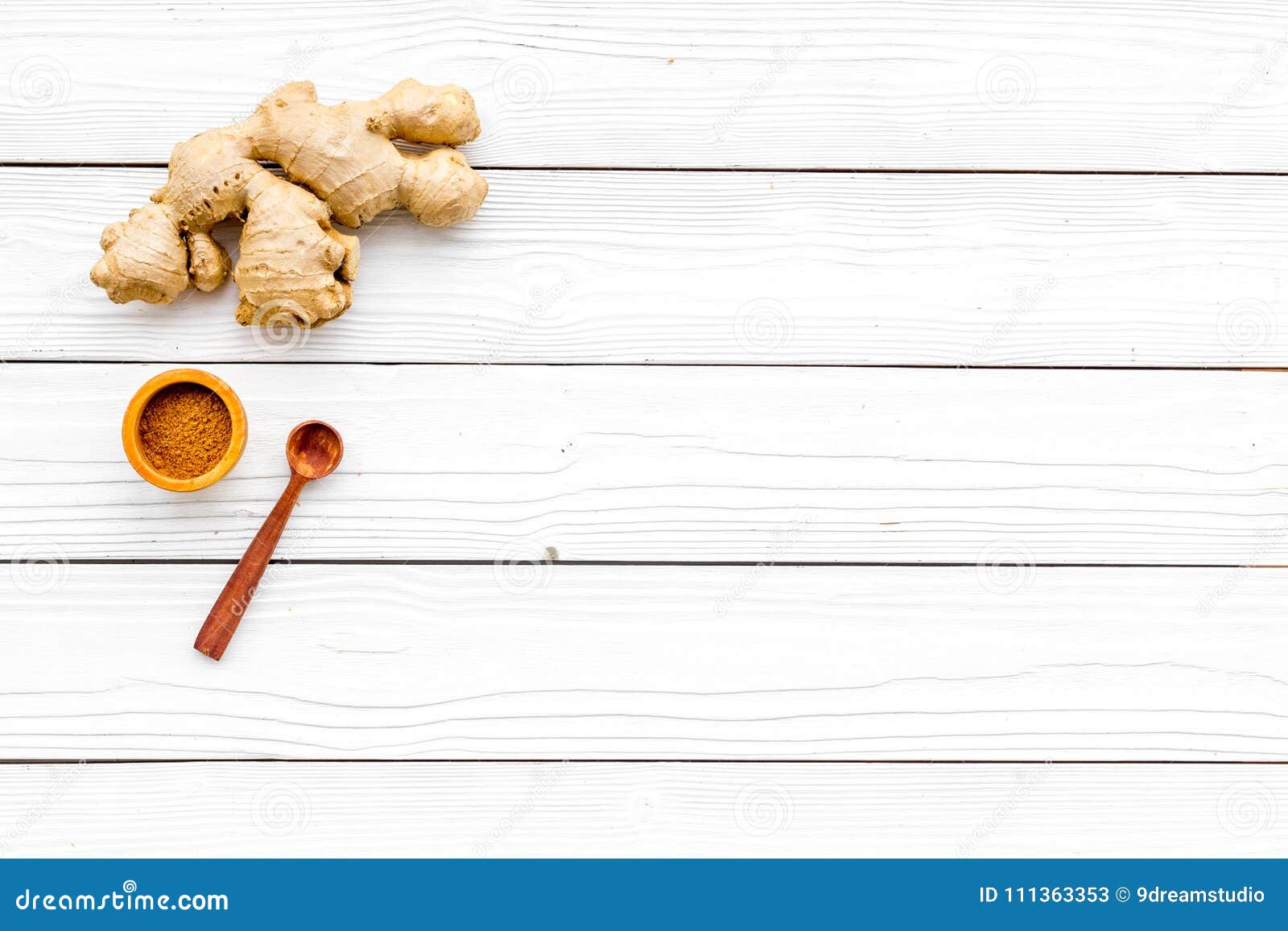 Spice and Condiment. Ground Ginger in Small Bowl Near Ginger Root on ... Spice and Condiment. Ground Ginger in Small Bowl Near Ginger Root on ...