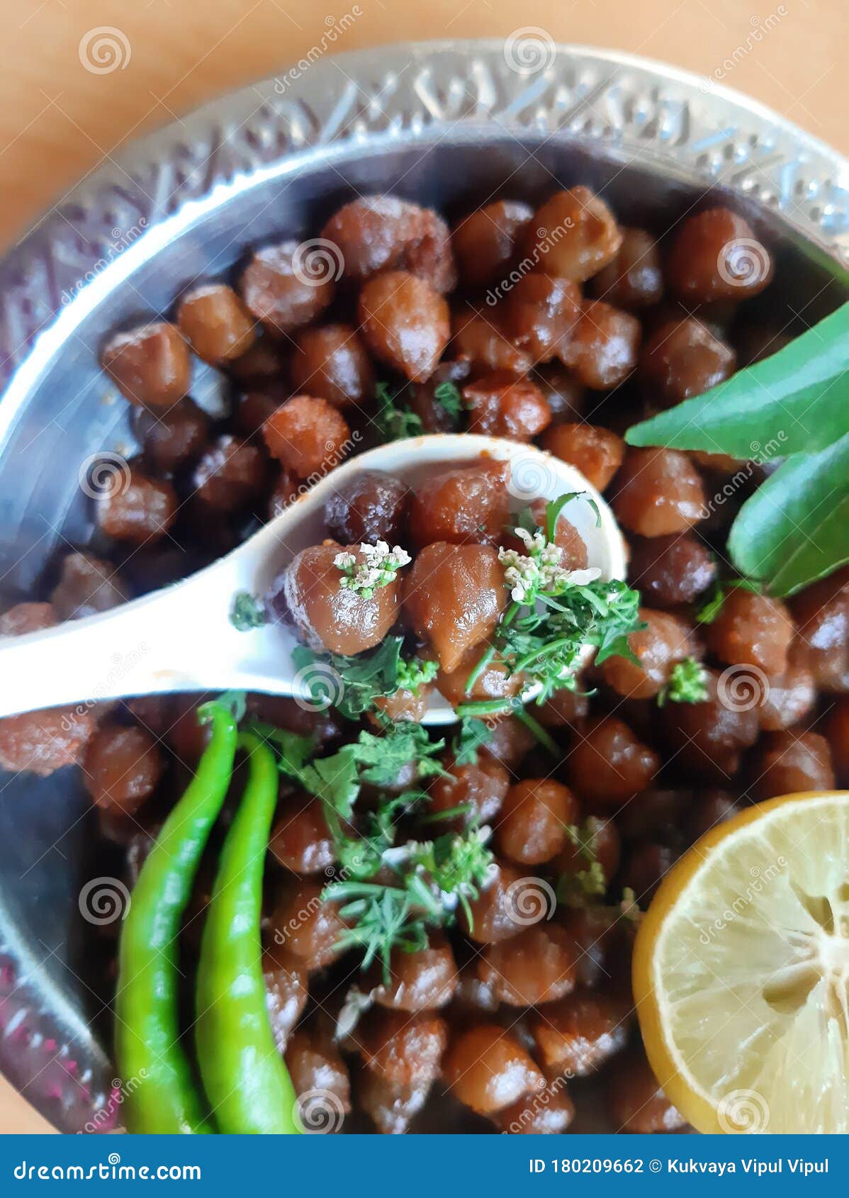 Spice Gram . Decorate Masala Chana with a Spoon in a Bowl. Stock Photo ...