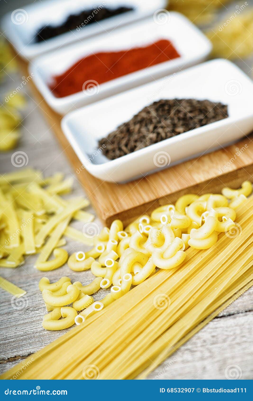 Spice and pasta stock image. Image of yellow, vegetarian - 68532907