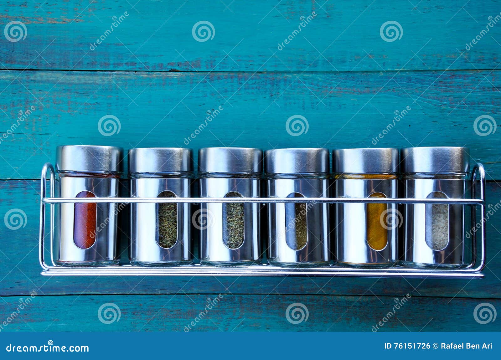 Spice Rack on a Wooden Wall Stock Photo - Image of spice, culinary ...