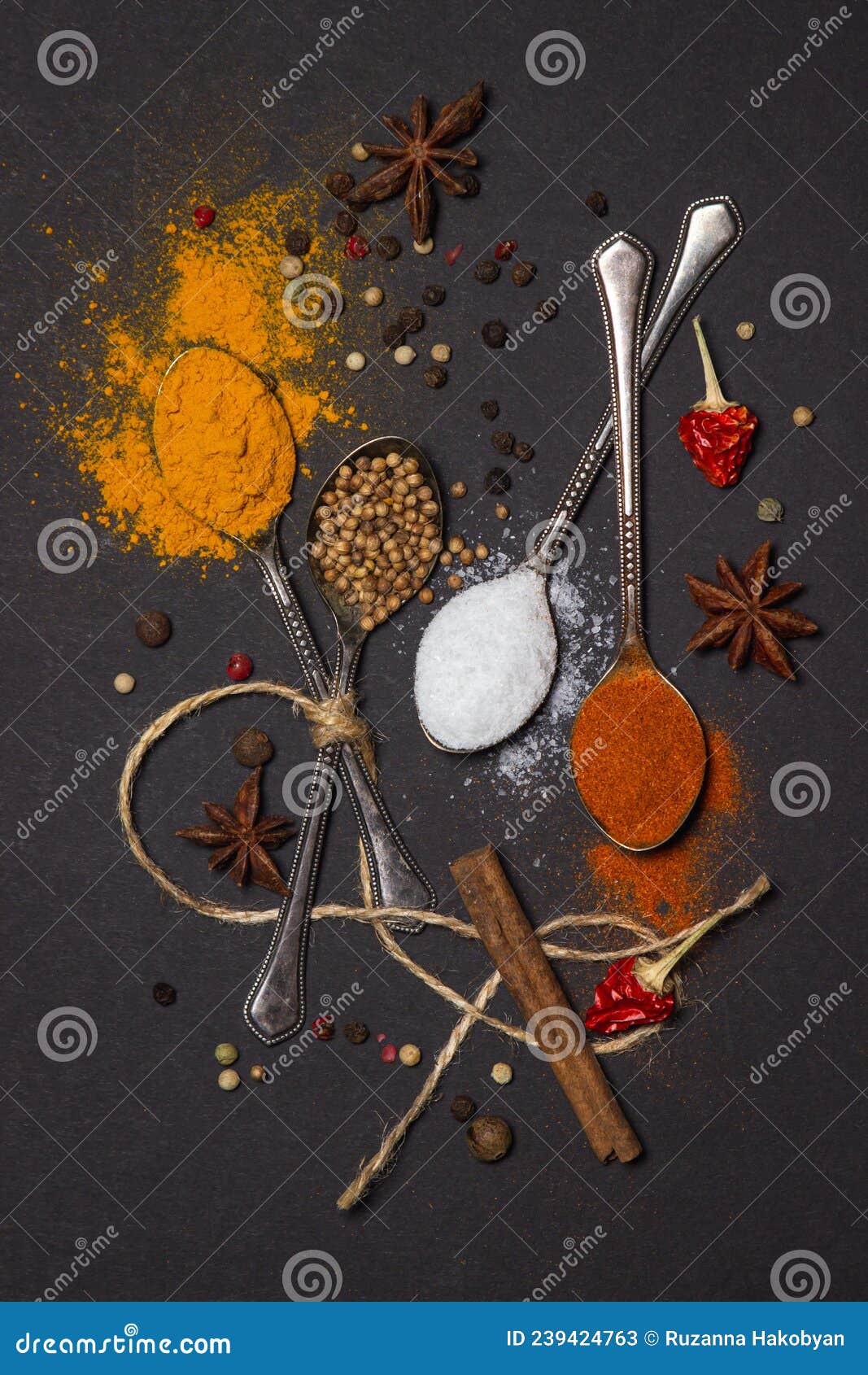 Spices on a Black Background. Spoons with Different Spices on a Dark ...
