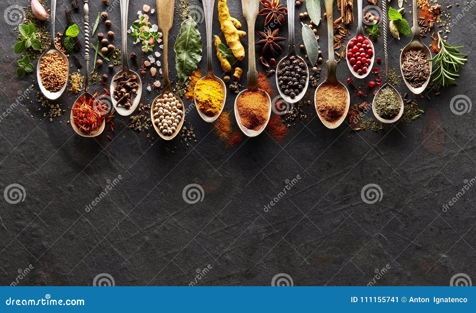Spices on black board stock image. Image of cooking - 111155741