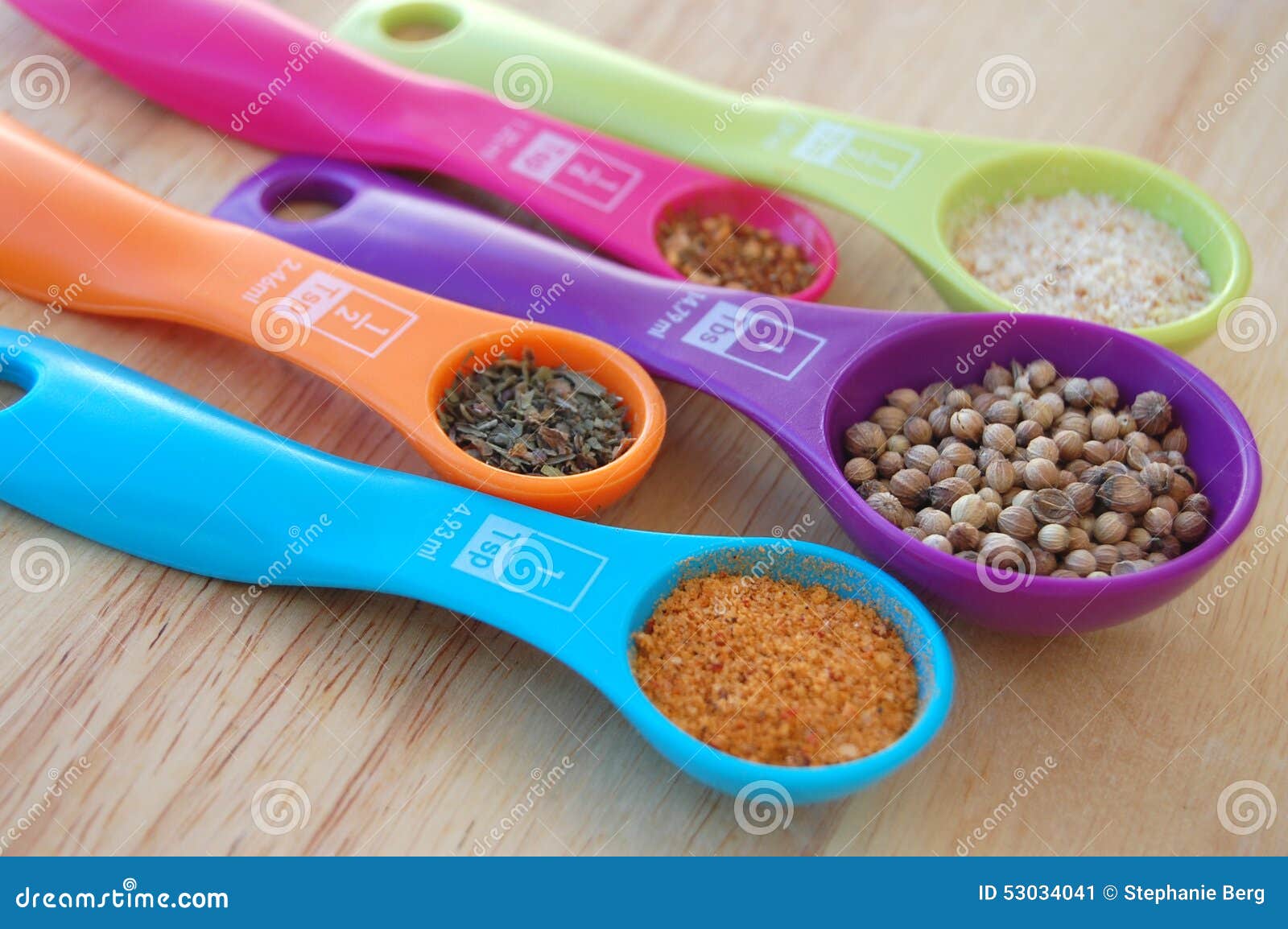 Spices in Colorful Measuring Spoons Stock Image - Image of purple ...