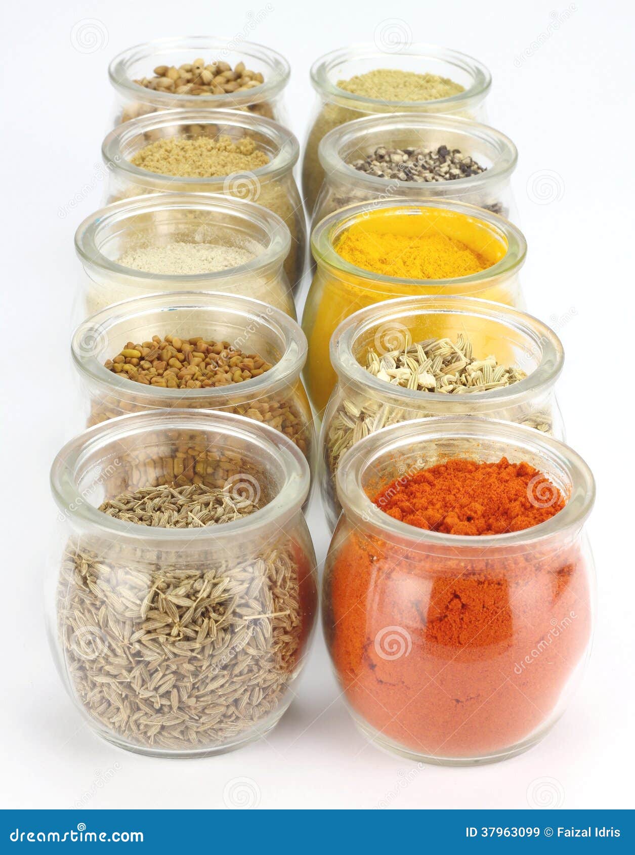 Spices in Glass Bottle stock image. Image of cuisine - 37963099