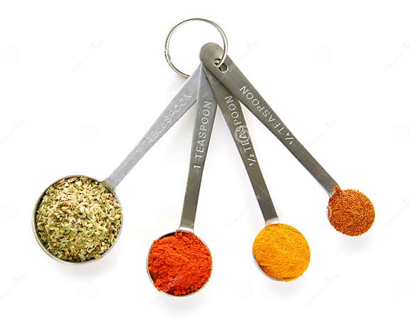 Spices in measuring spoons stock photo. Image of cook - 3822750