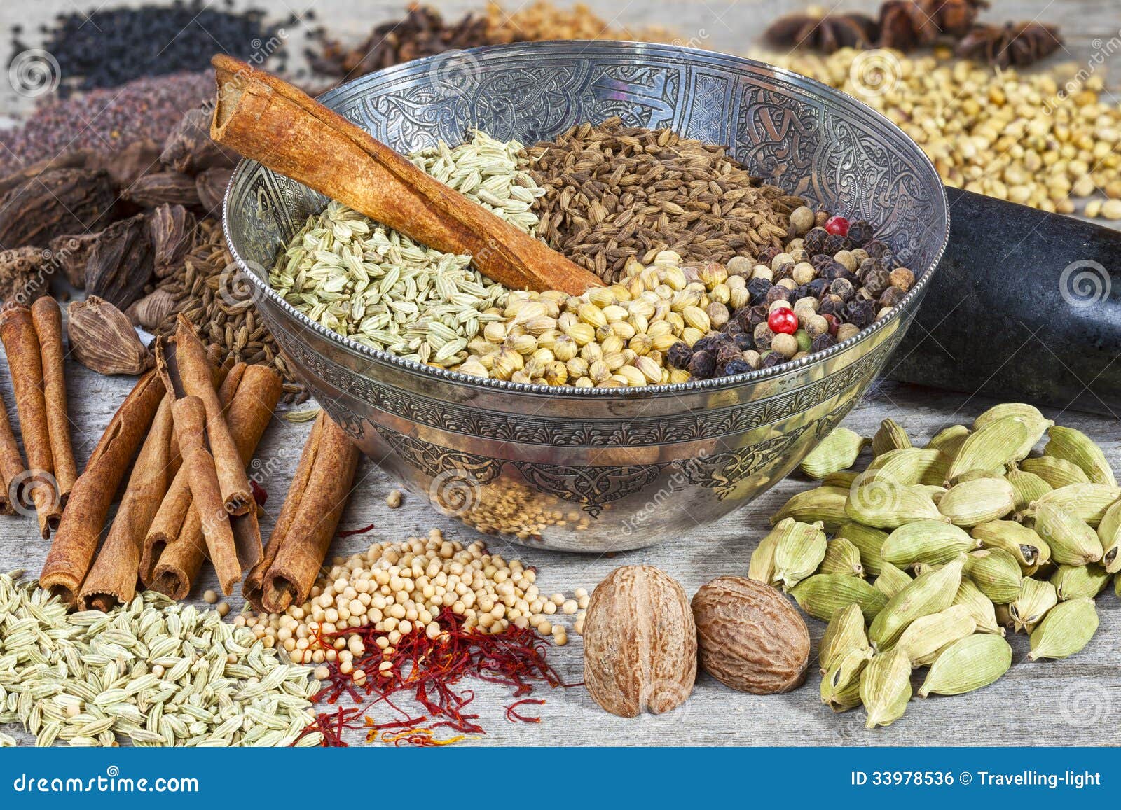 Spices on a Rustic Board stock photo. Image of nigella - 33978536