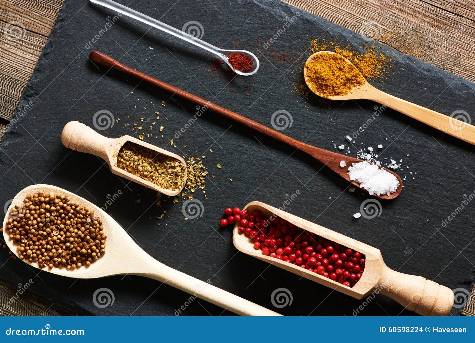 Spices in wooden utensils stock photo. Image of nature - 60598224