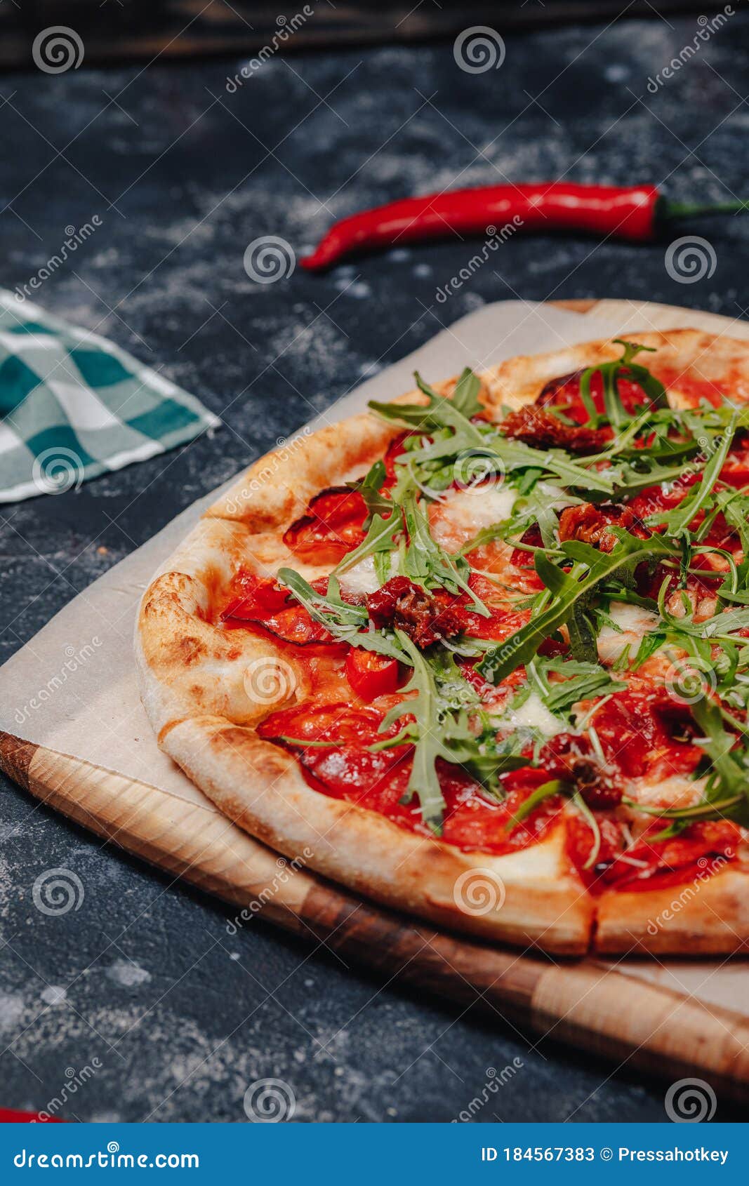 Spicy Appetizing Neapolitan Pizza on Board with Cherry Tomatoes and ...