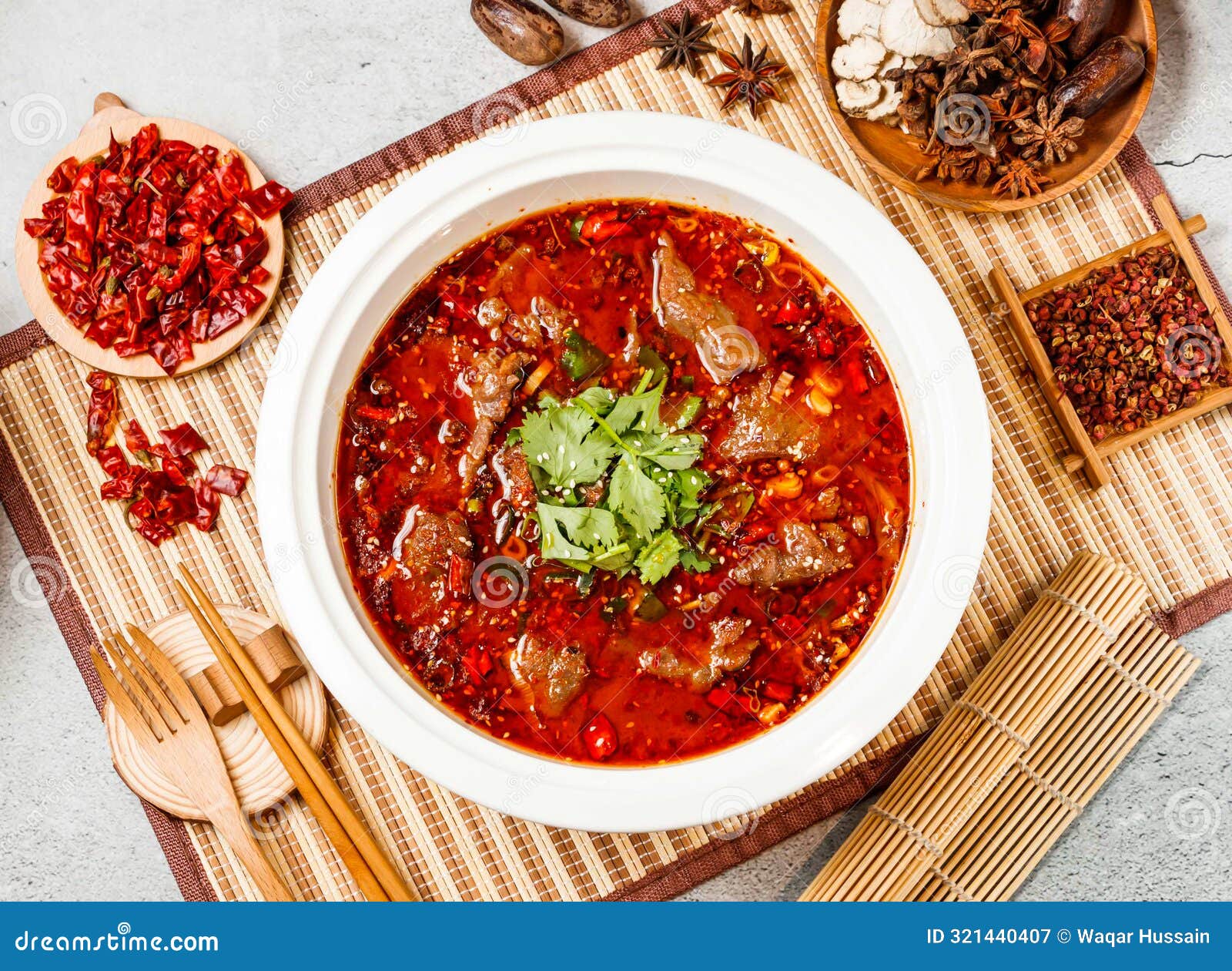 Spicy Boiled Beef with Coriander, Red Chilli, Chopsticks and Fork ...