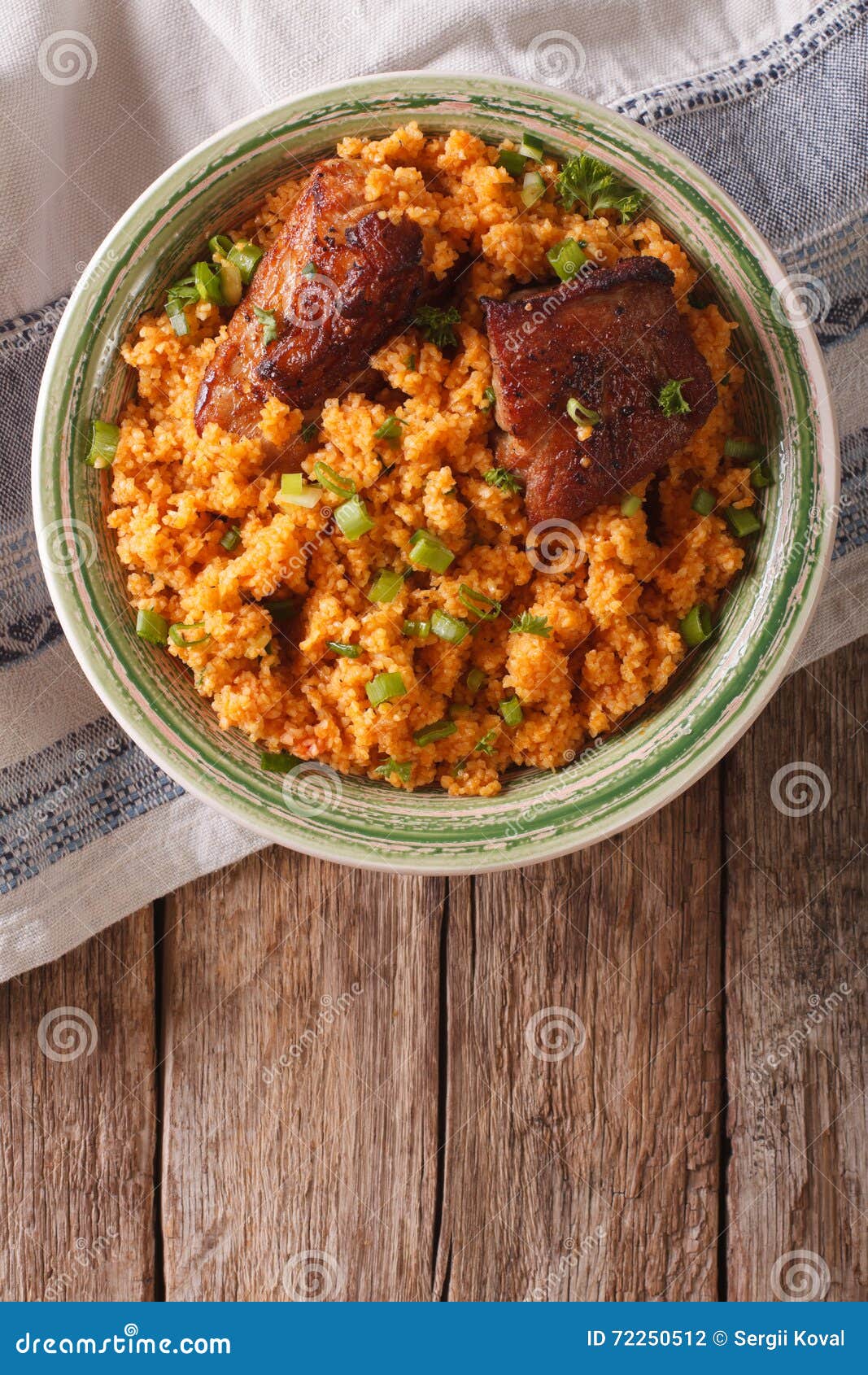 Spicy Bulgur with Beef Close-up on a Plate on the Table. Vertical Top ...