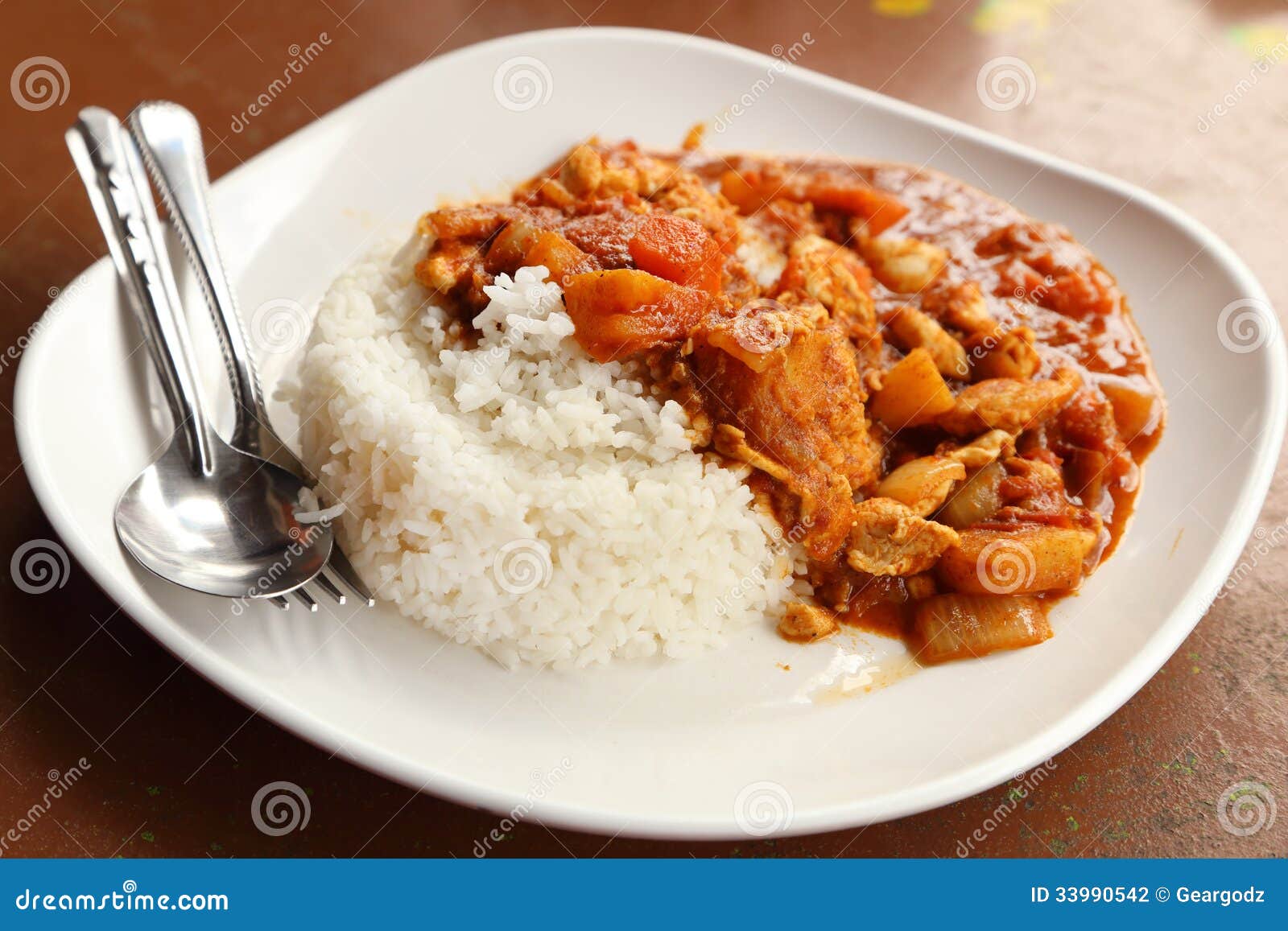 Spicy Chicken Curry and Rice Stock Photo - Image of meal, herb: 33990542