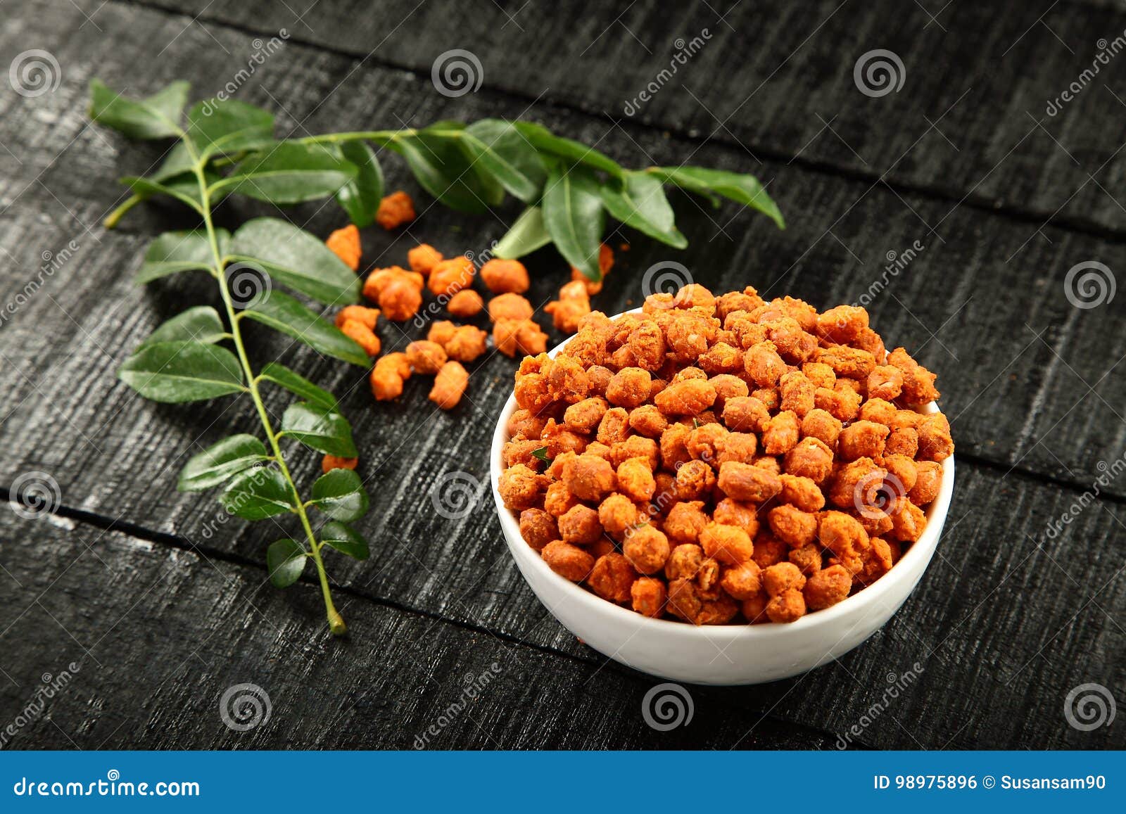 Spicy coated peanuts. stock photo. Image of leaves, curry - 98975896