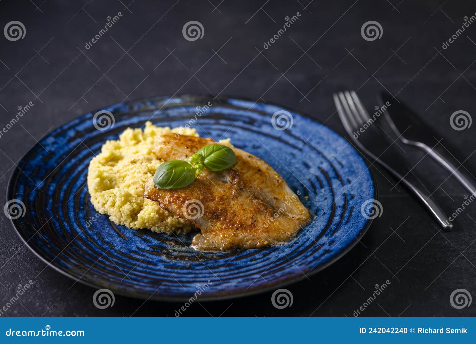 Spicy Fillet of White Cod with Couscous Stock Photo - Image of seafood ...