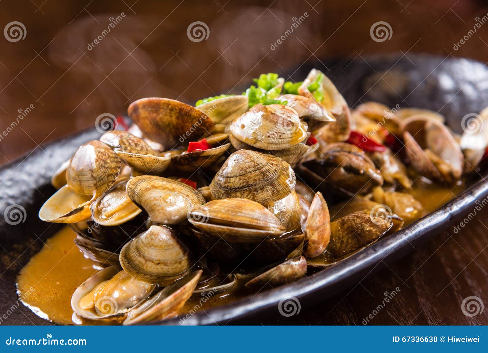 Spicy fried clams stock photo. Image of restaurant, prik - 67336630